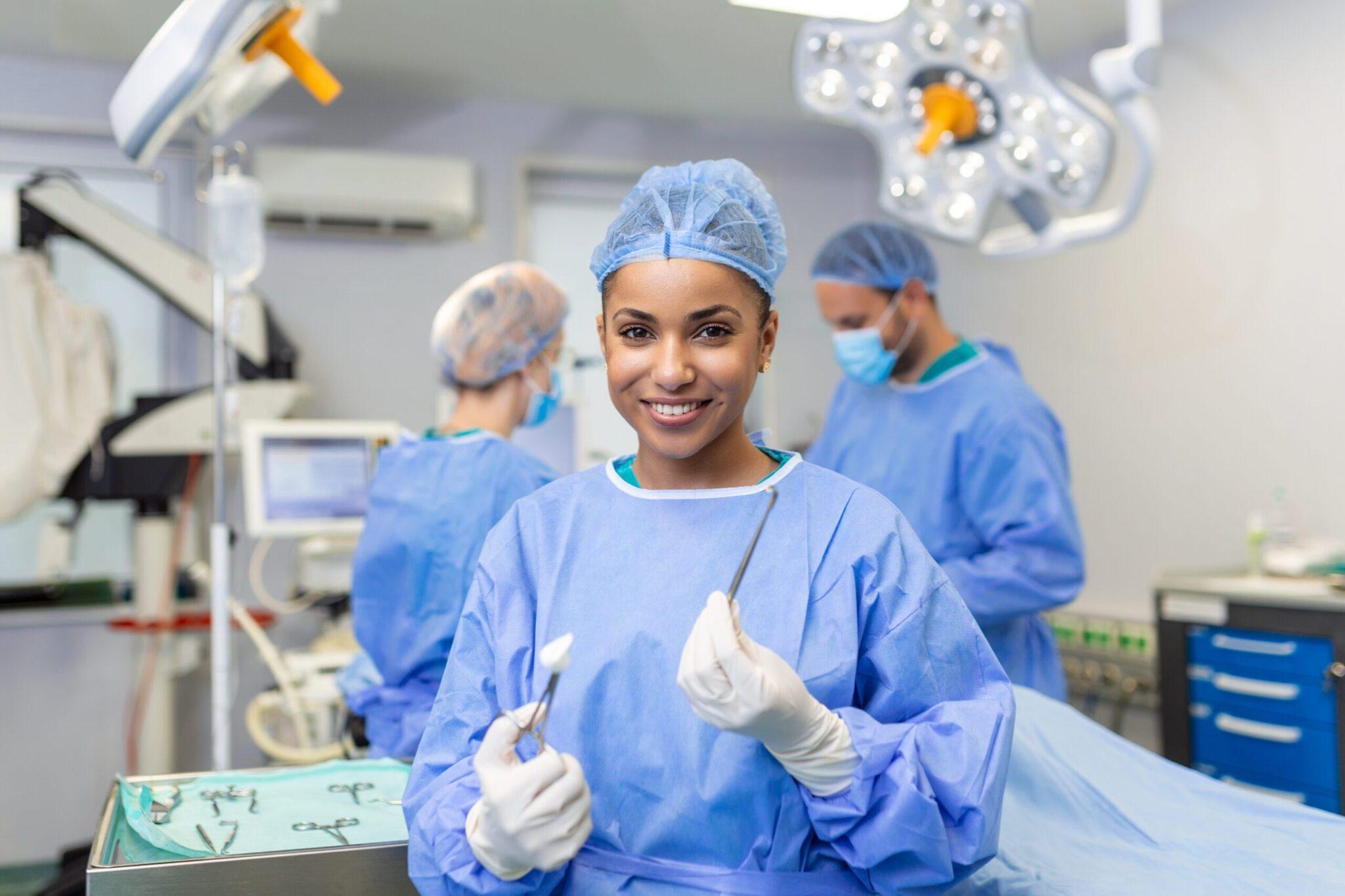 Portrait of African American woman surgeon standing in operating room ...